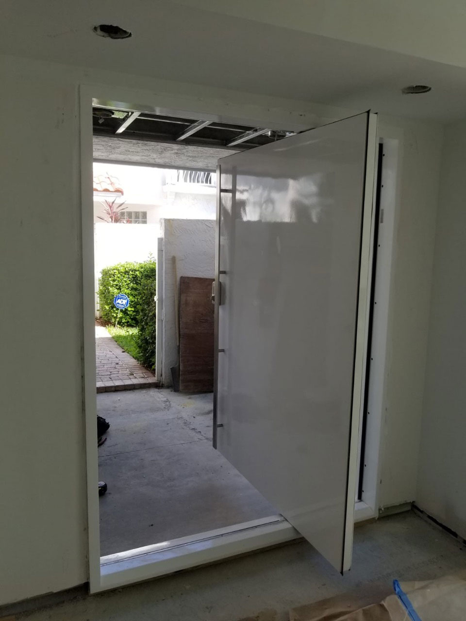 White Glossy Pivot - Custom Wood Doors